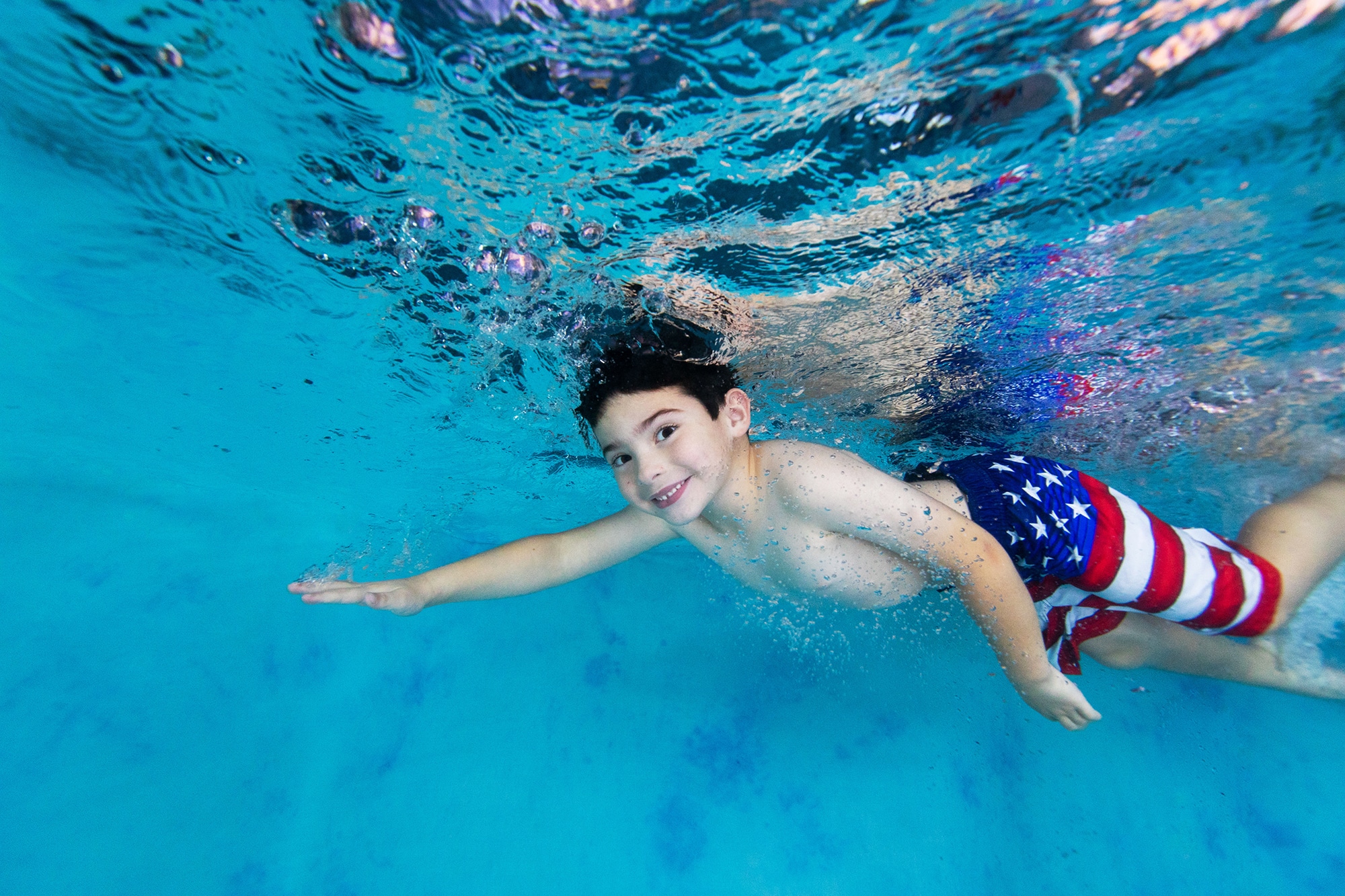 Swim Scholarships for Kids | Bear Paddle Swim School